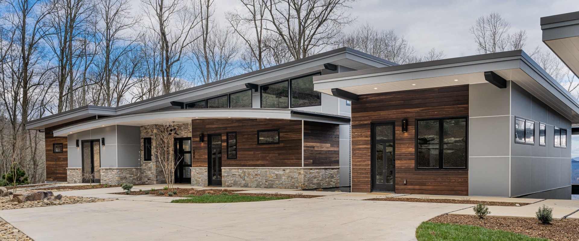 Enhance Your Timber Frame Home With Concrete Driveway Installation In ...